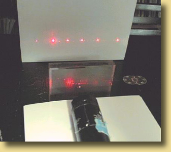 Grating in the converging optical beam